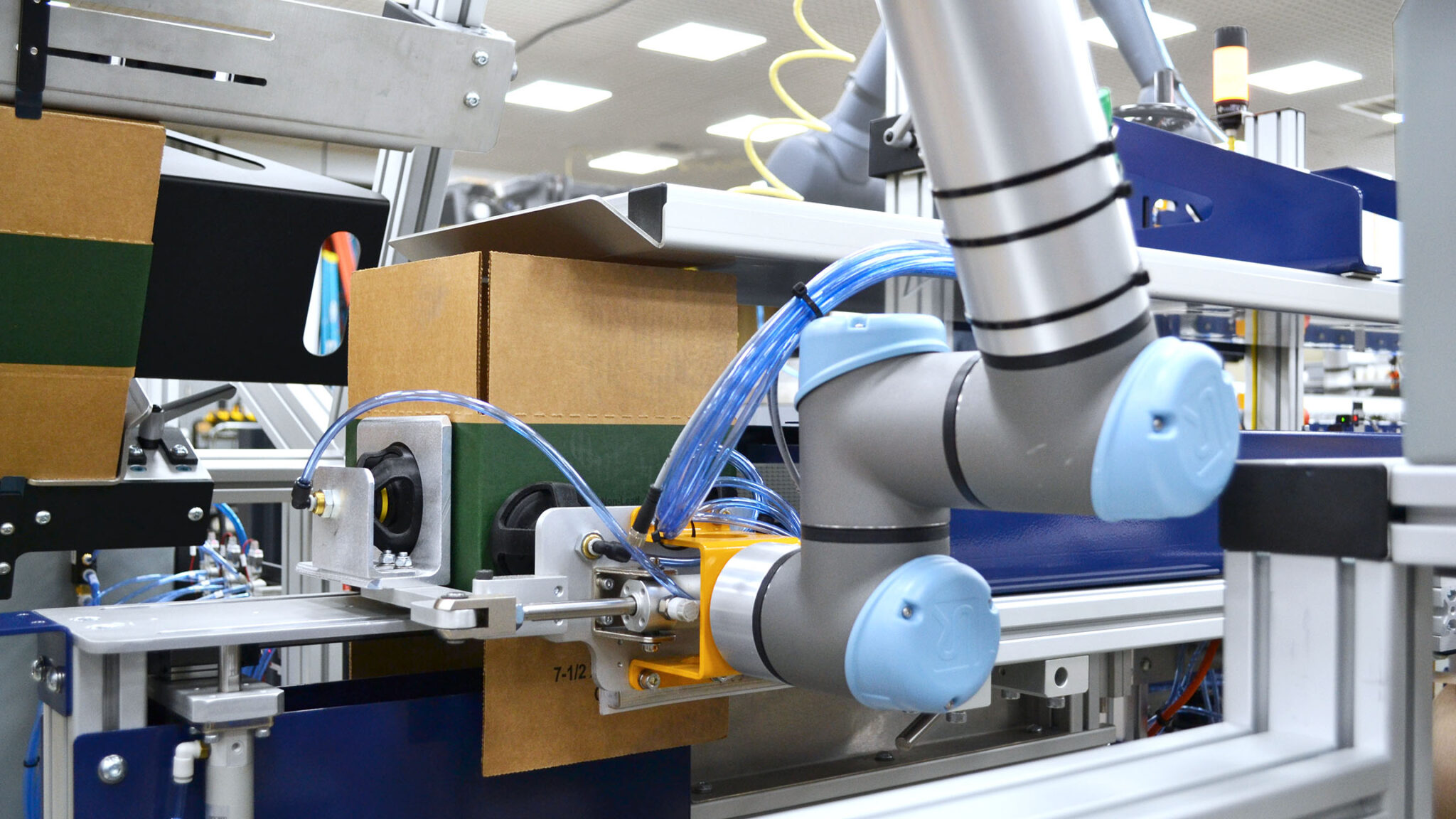 How Cobot Case Erectors Drive End-of-Line Efficiency - ONExia